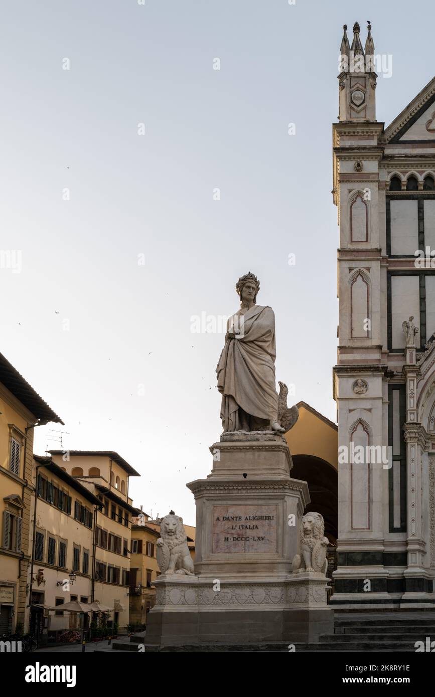 A vertical shot of The Statue of Dante Alighieri in Piazza Santa Croce ...