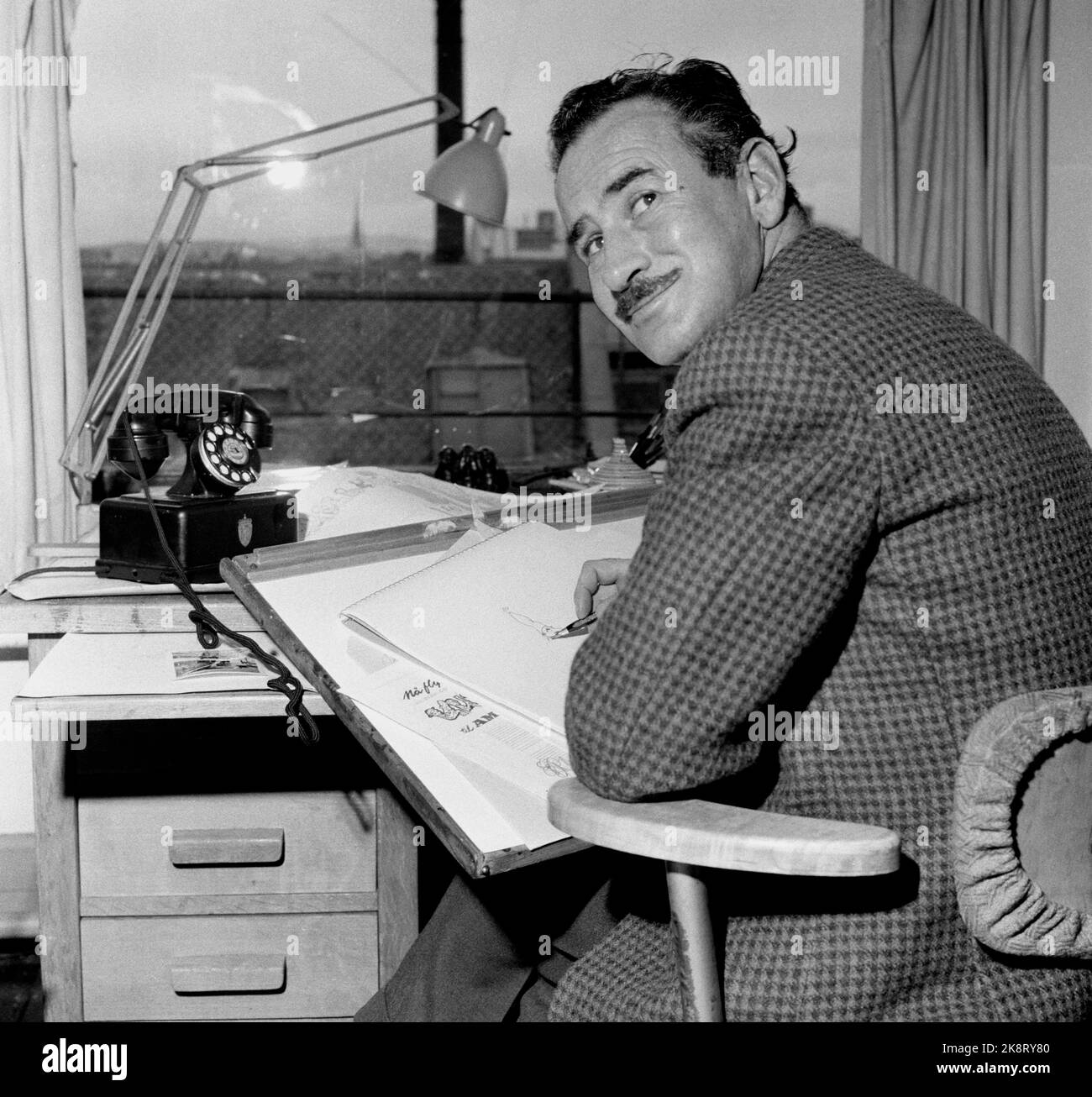 Oslo 195712 Newspaper cartoonist Salo Grenning, Pedro, in VG, draws ...