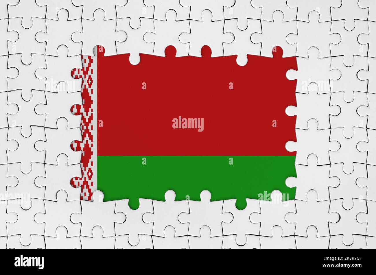 Belarus flag in frame of white puzzle pieces with missing central parts ...