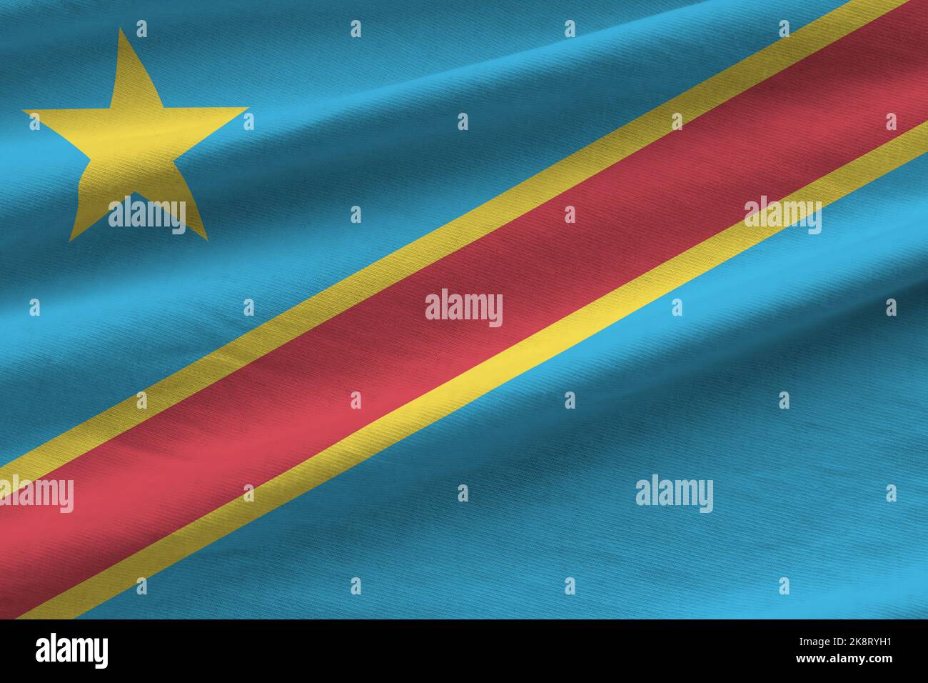 Democratic Republic of the Congo flag with big folds waving close up ...