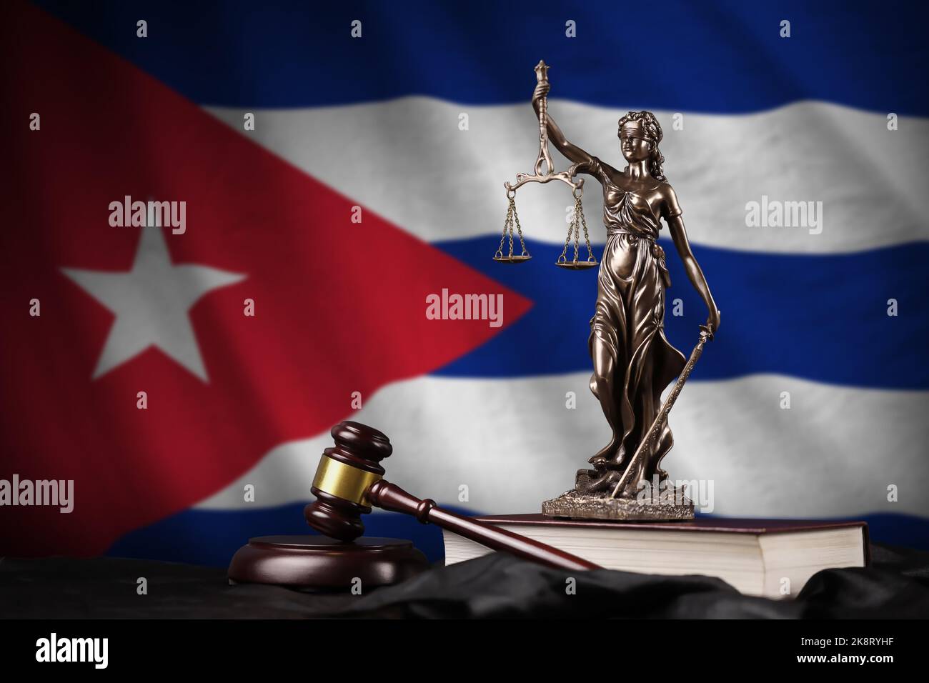 Cuba flag with statue of lady justice, constitution and judge hammer on ...