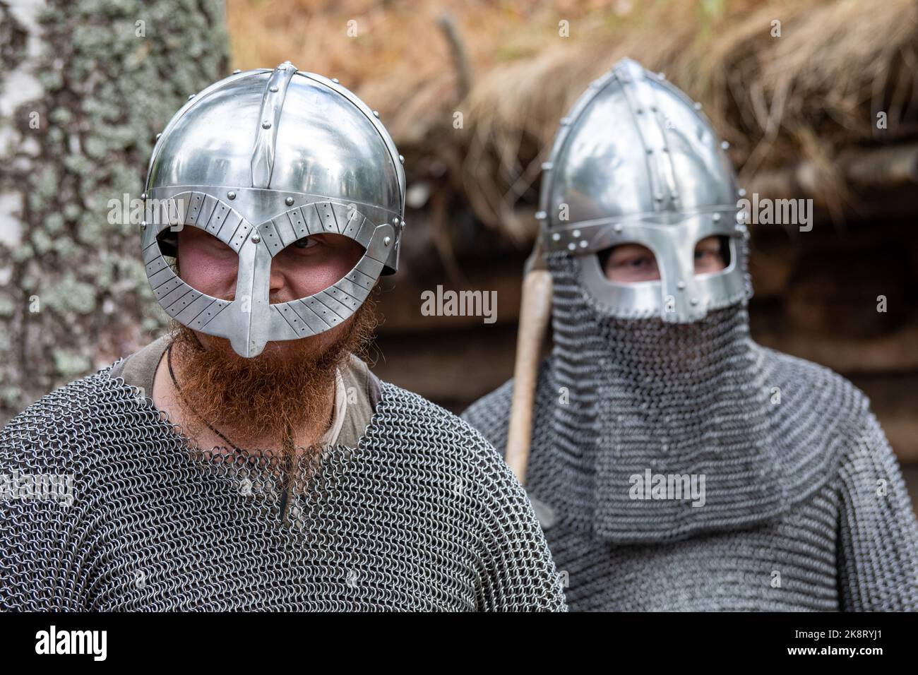 Reenactors wearing compact helmets at Pukkisaari Iron Age Market ...