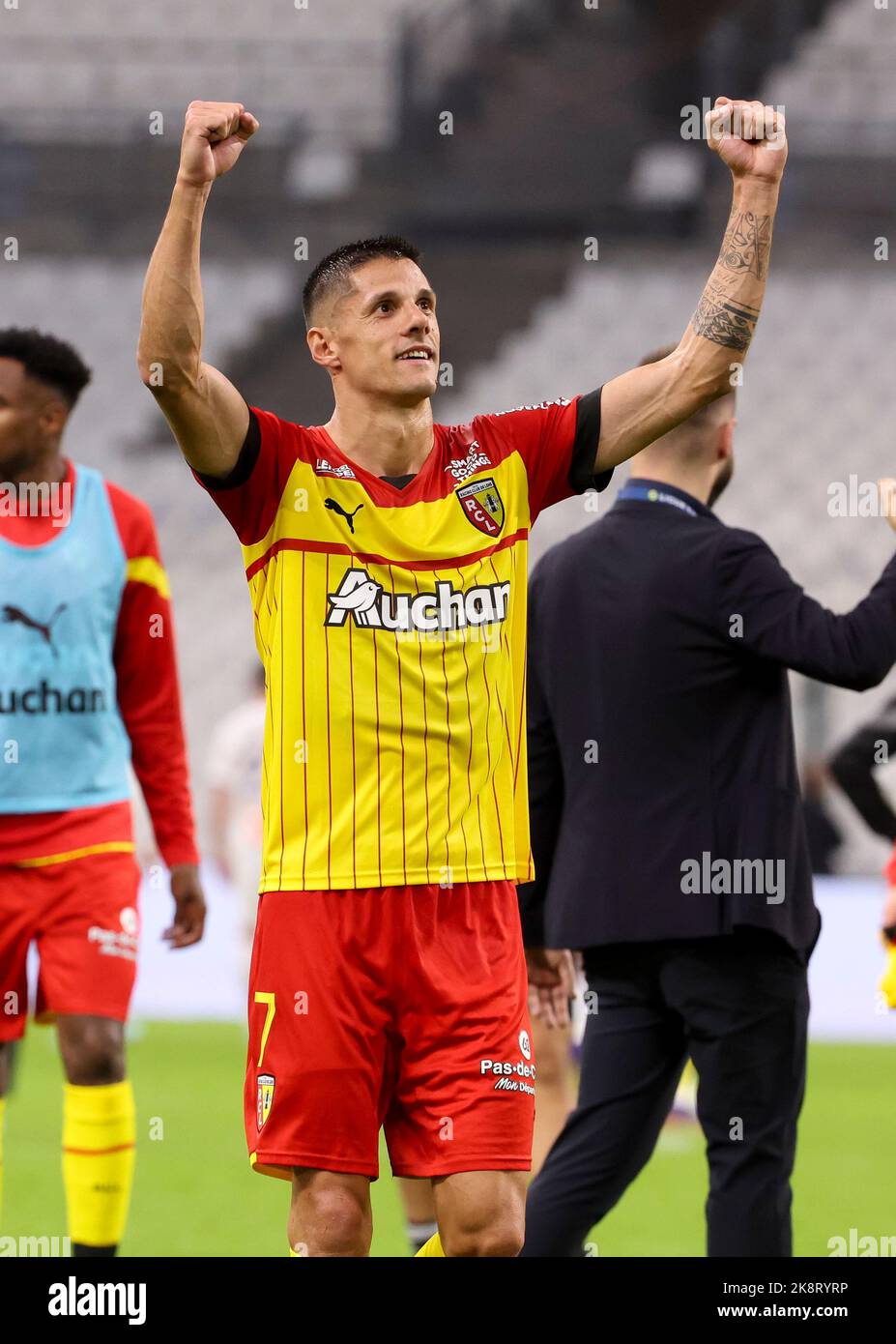 Florian Sotoca of Lens celebrates the victory following the French ...