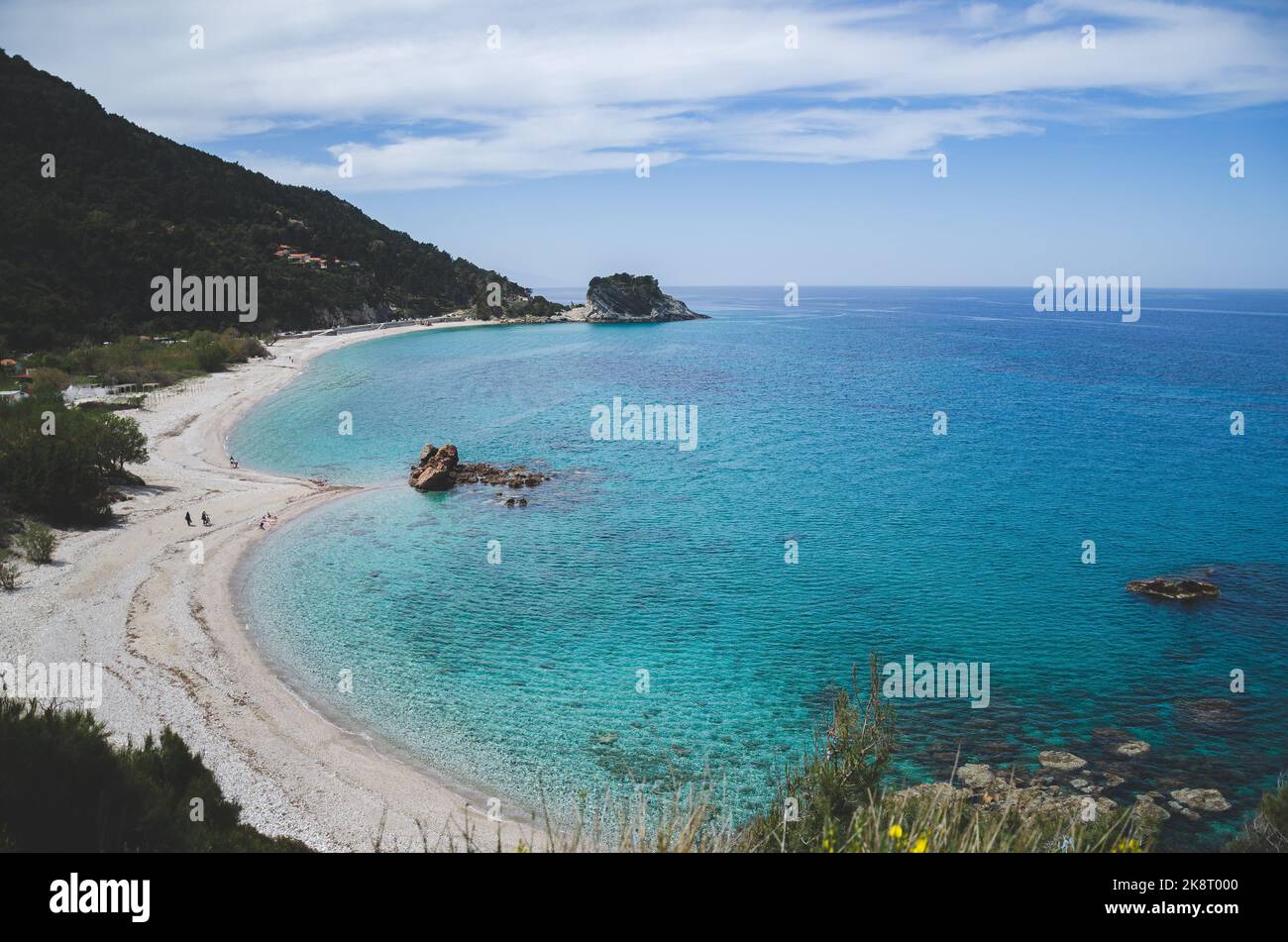 A landscape shot of the beautiful Potami Beach under the blue cloudy ...