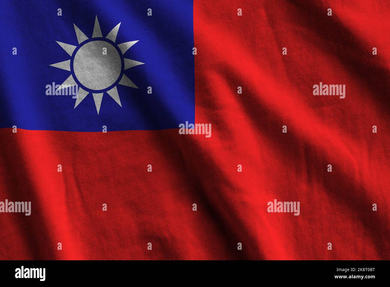 Taiwan flag with big folds waving close up under the studio light ...