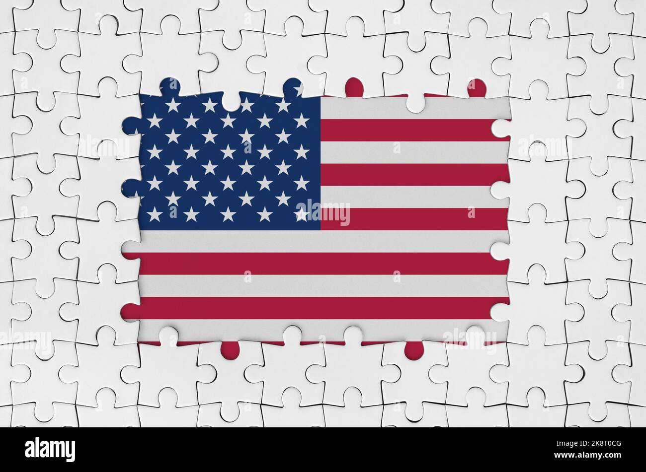 United States of America flag in frame of white puzzle pieces with ...