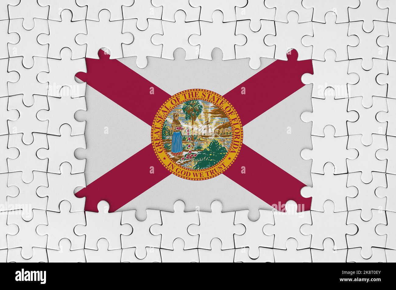 Florida US state flag in frame of white puzzle pieces with missing ...