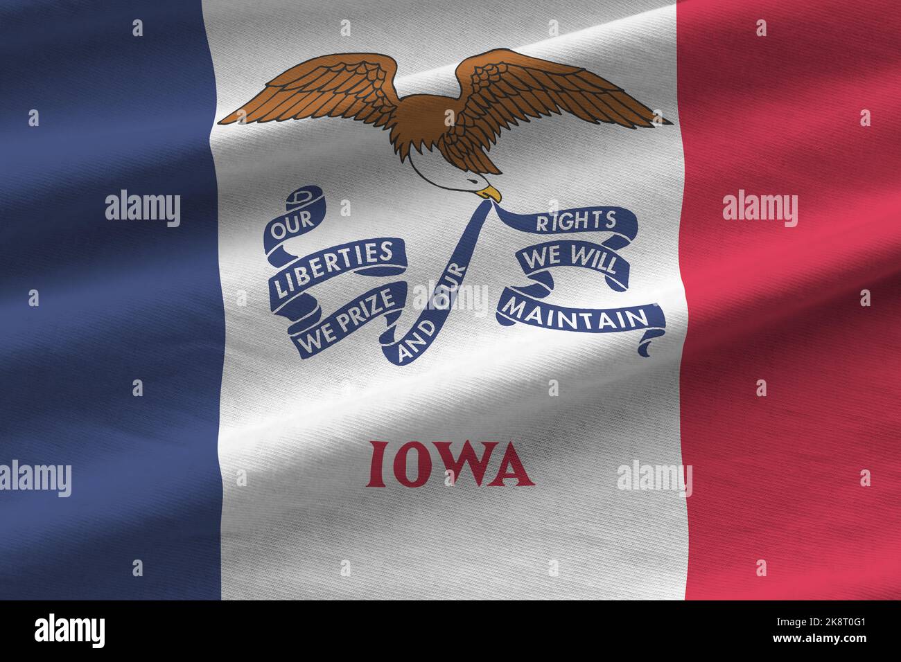 Iowa US state flag with big folds waving close up under the studio ...