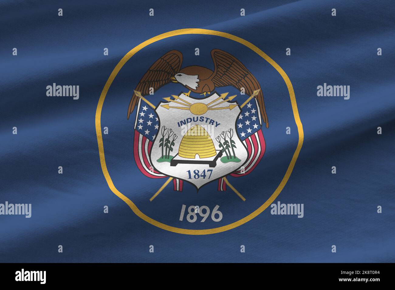 Utah US state flag with big folds waving close up under the studio ...