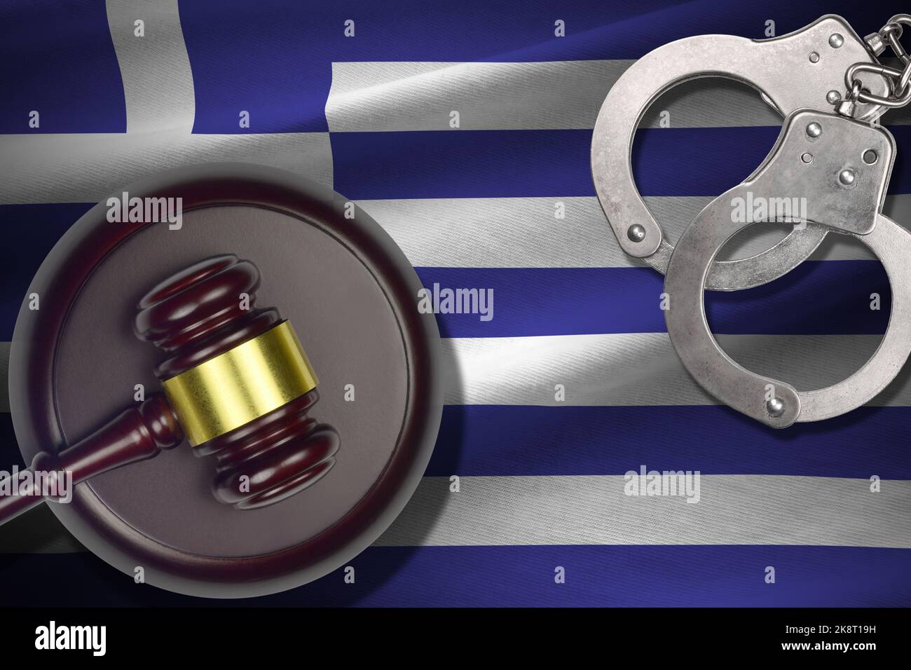 Greece flag with judge mallet and handcuffs in dark room. Concept of ...