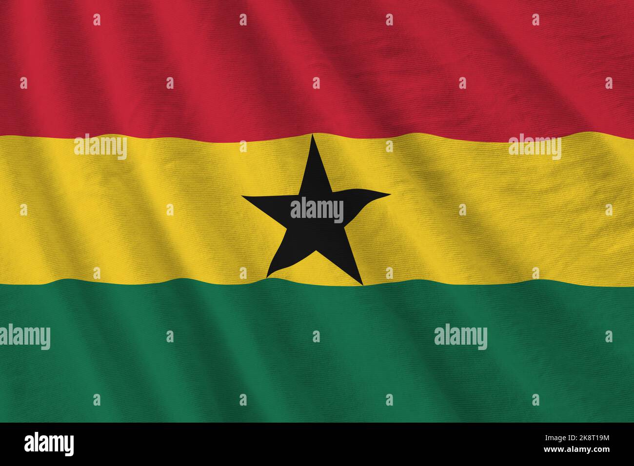 Ghana Flag With Big Folds Waving Close Up Under The Studio Light Ghana Flag With Big Folds Waving Close Up Under The Studio Light