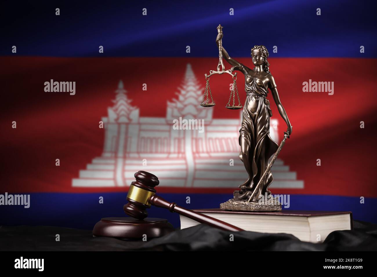 Cambodia flag with statue of lady justice, constitution and judge ...