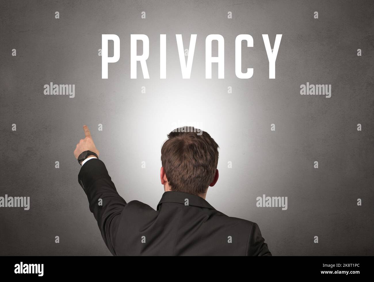 Rear view of a businessman with inscription Stock Photo - Alamy