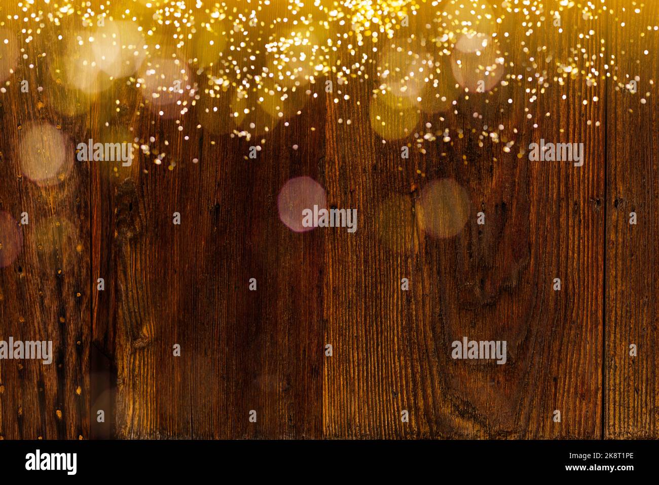 Christmas and New Year wooden background with light Stock Photo - Alamy