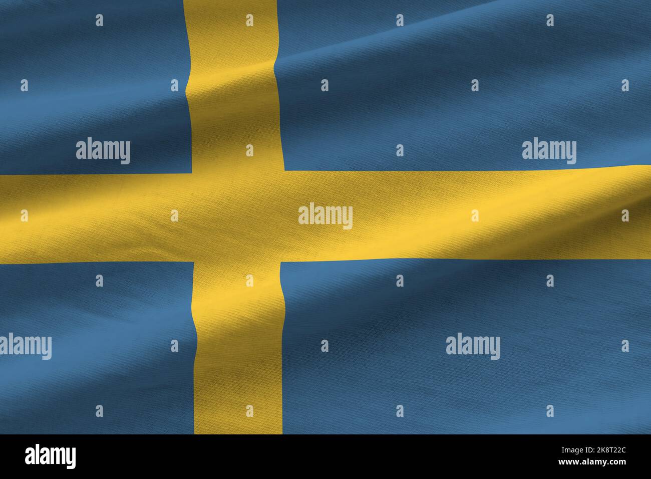 Sweden flag with big folds waving close up under the studio light ...
