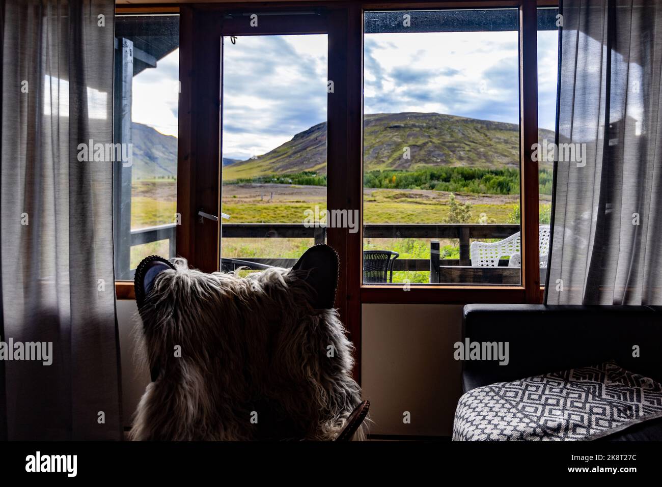 A beautiful landscape in Iceland from a cozy room window Stock Photo ...