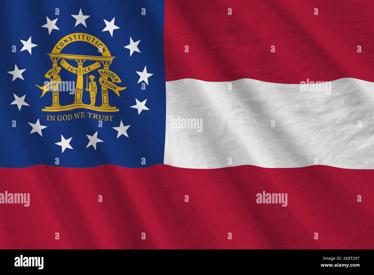 Georgia US state flag with big folds waving close up under the studio ...