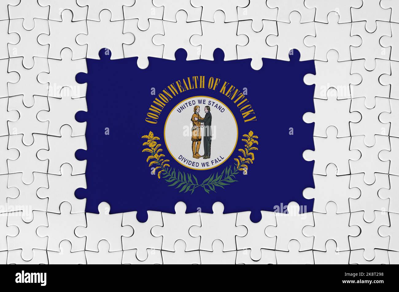Kentucky US state flag in frame of white puzzle pieces with missing ...