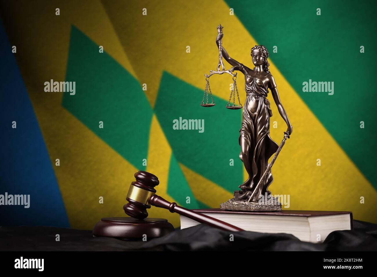 Saint Vincent and the Grenadines flag with statue of lady justice ...