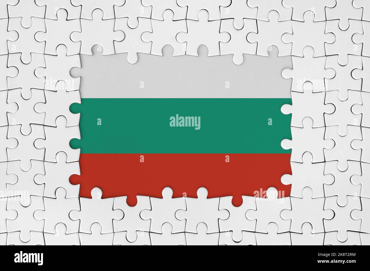 Bulgaria flag in frame of white puzzle pieces with missing central ...