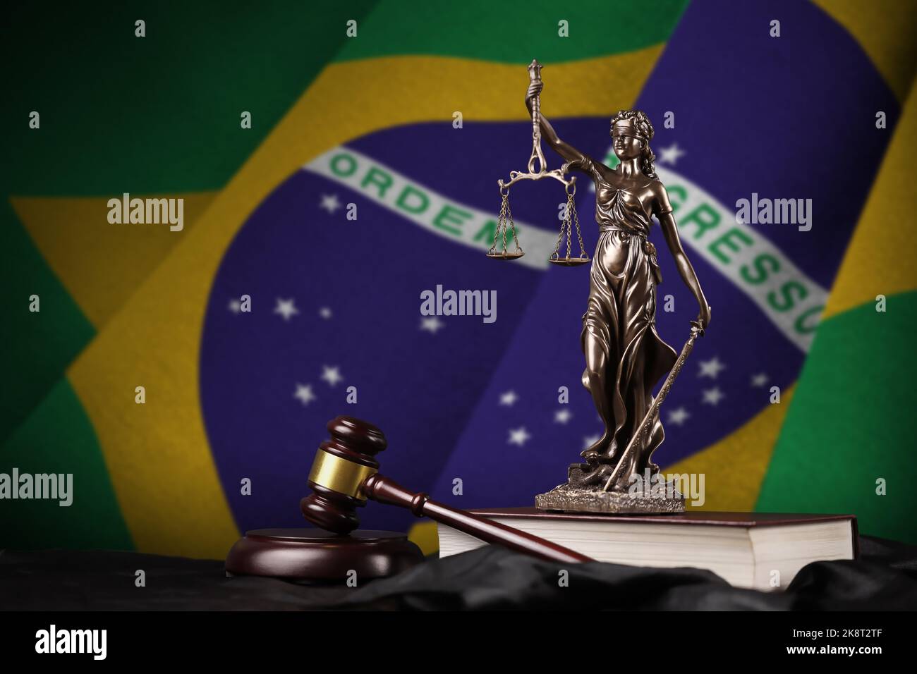 Brazil flag with statue of lady justice, constitution and judge hammer ...
