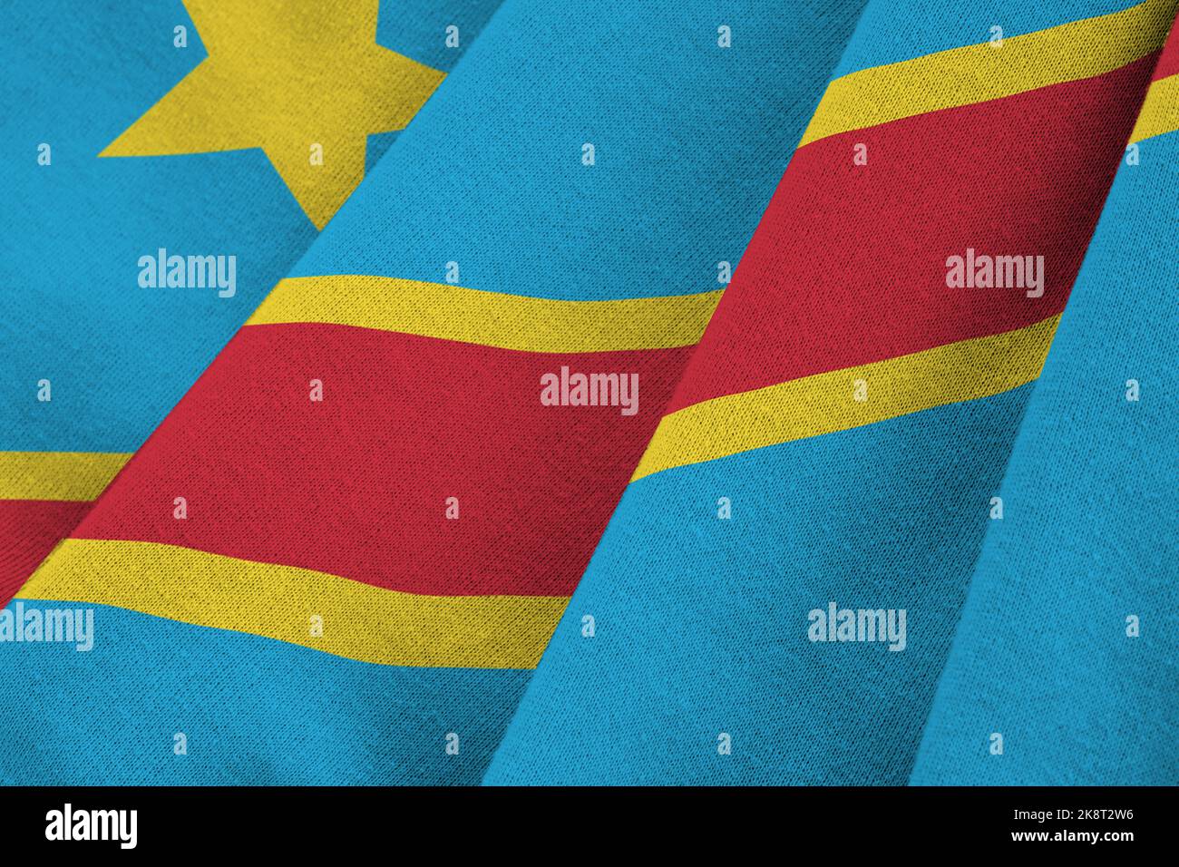 Democratic Republic of the Congo flag with big folds waving close up ...