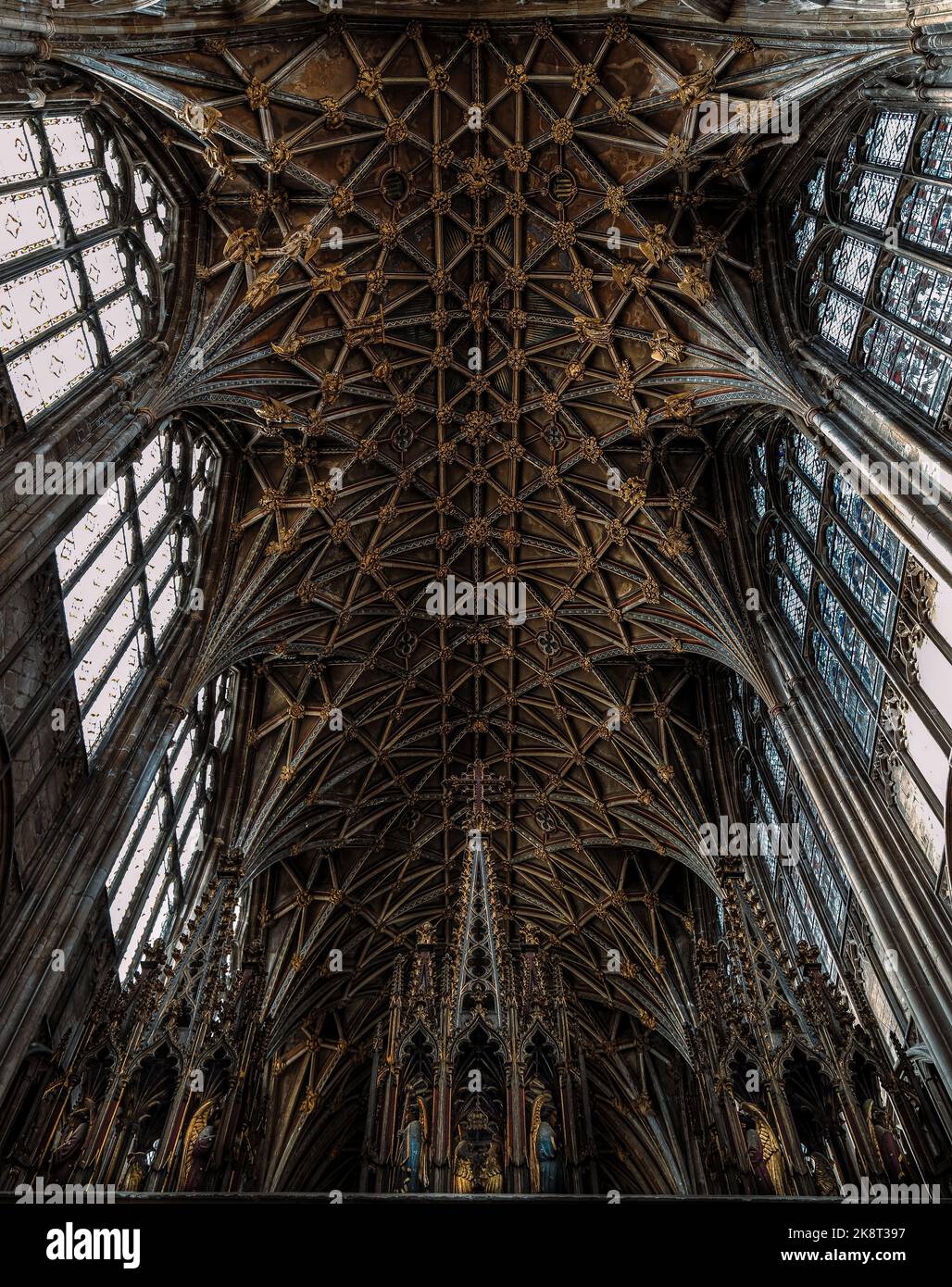 A vertical low angle shot of the Gloucester Cathedral Cloisters with ...