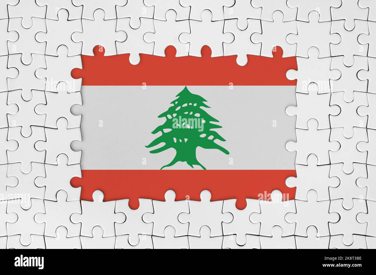 Lebanon flag in frame of white puzzle pieces with missing central parts ...