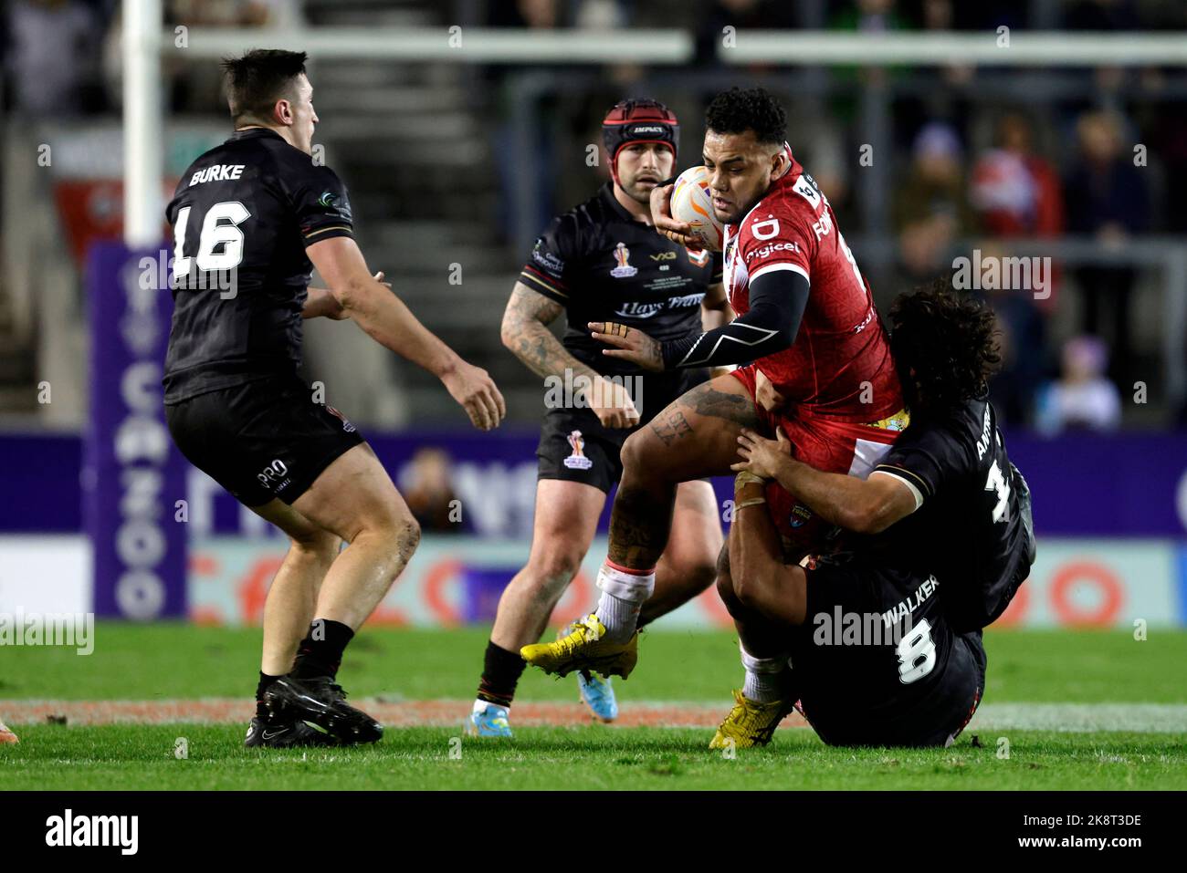 Tonga's Addin Fonua-Blake is tackled by Wales' Anthony Walker and ...