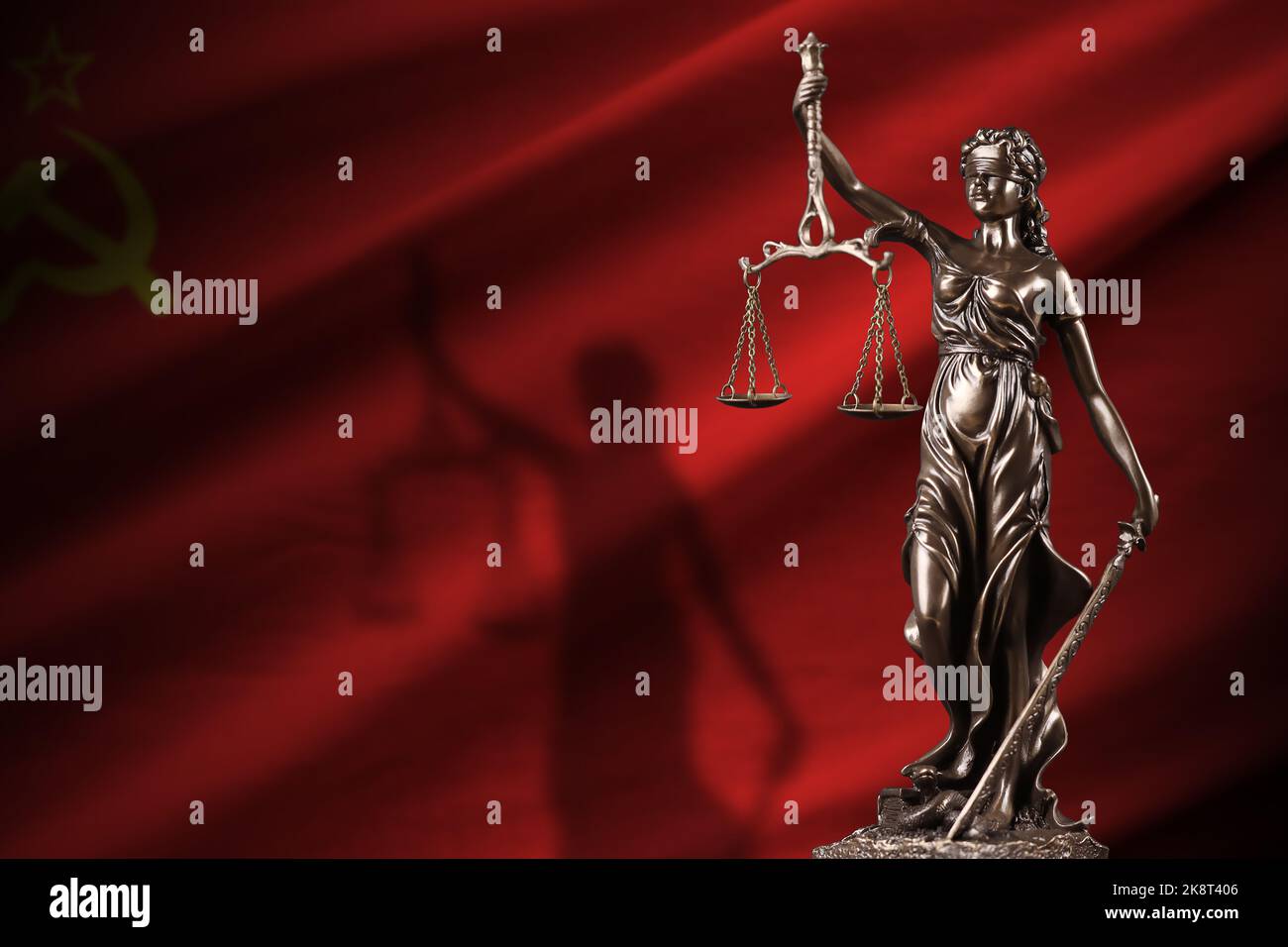 Soviet Union flag with statue of lady justice and judicial scales in ...