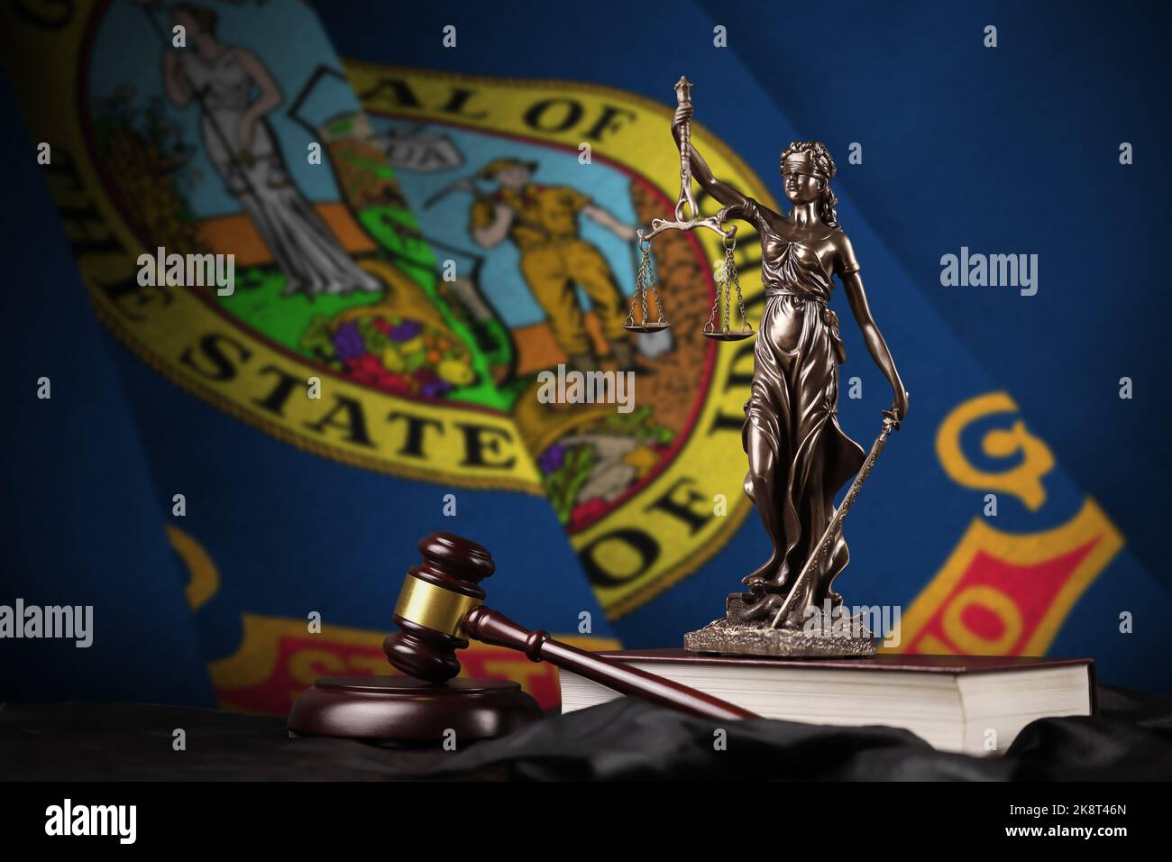 Idaho US state flag with statue of lady justice, constitution and judge ...