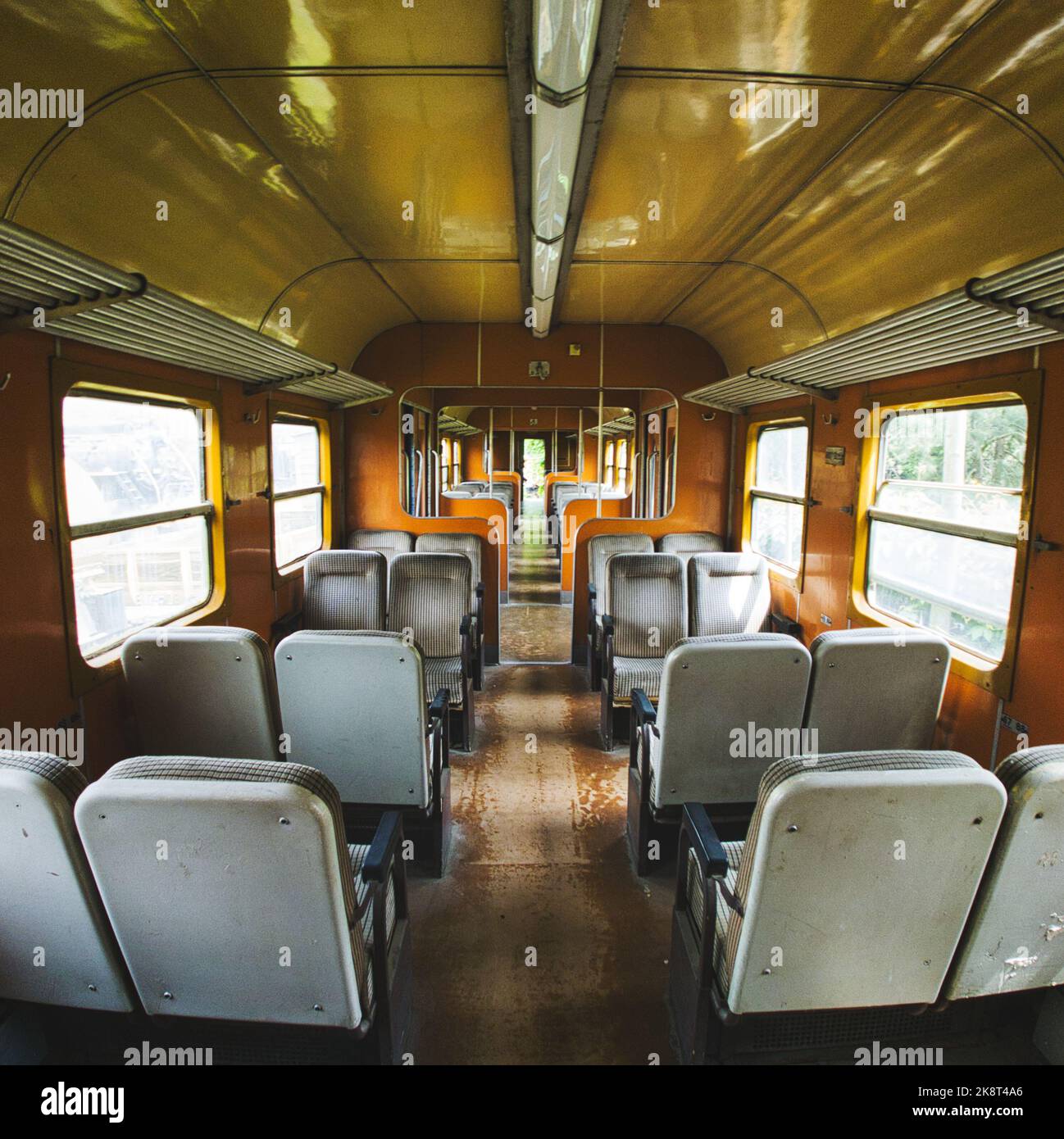 An interior of old train with seats Stock Photo - Alamy