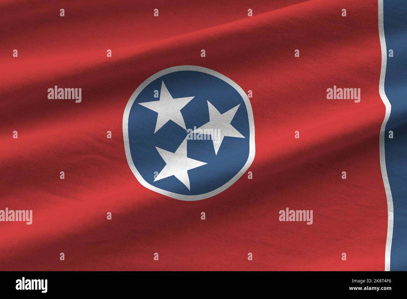 Tennessee US state flag with big folds waving close up under the studio ...
