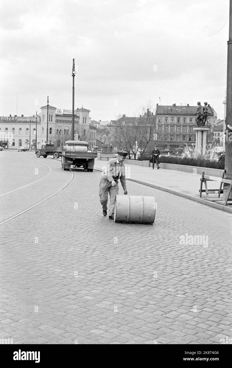 A worker rolls a barrel barrel photo hi-res stock photography and ...
