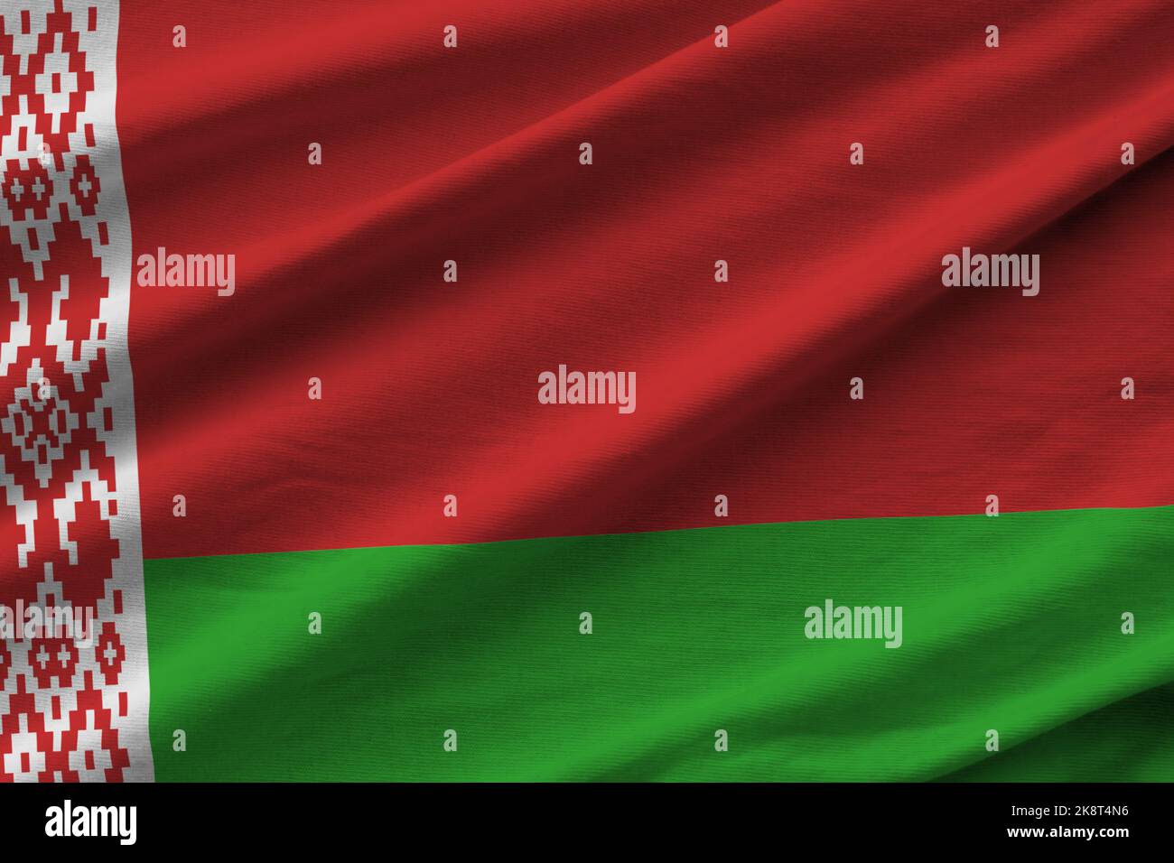 Belarus flag with big folds waving close up under the studio light ...