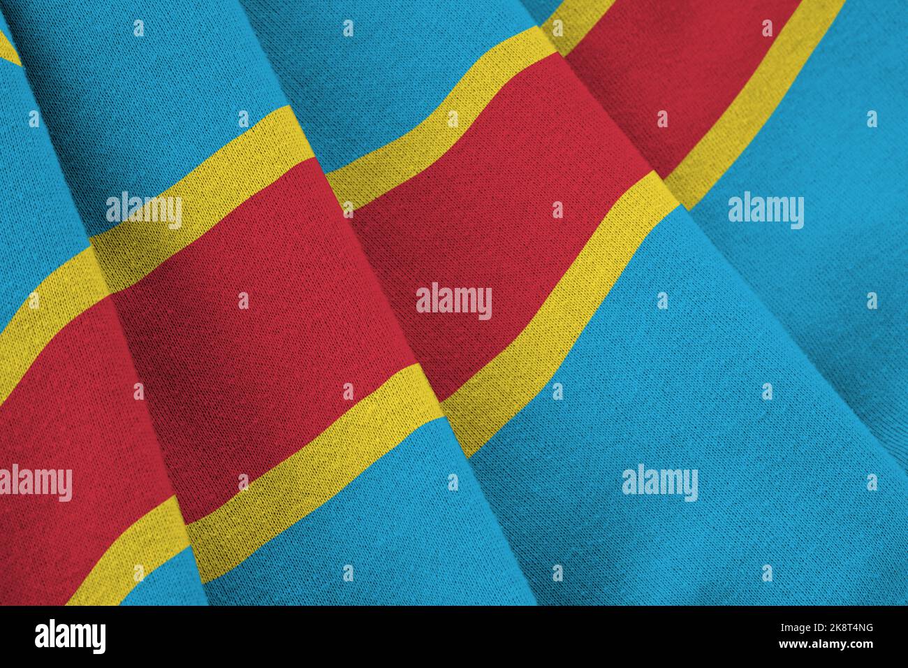 Democratic Republic of the Congo flag with big folds waving close up ...