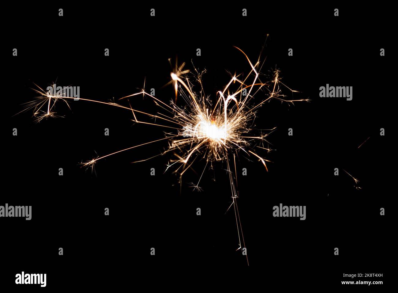 Burning sparkler isolated on black background. Fireworks theme. Light ...