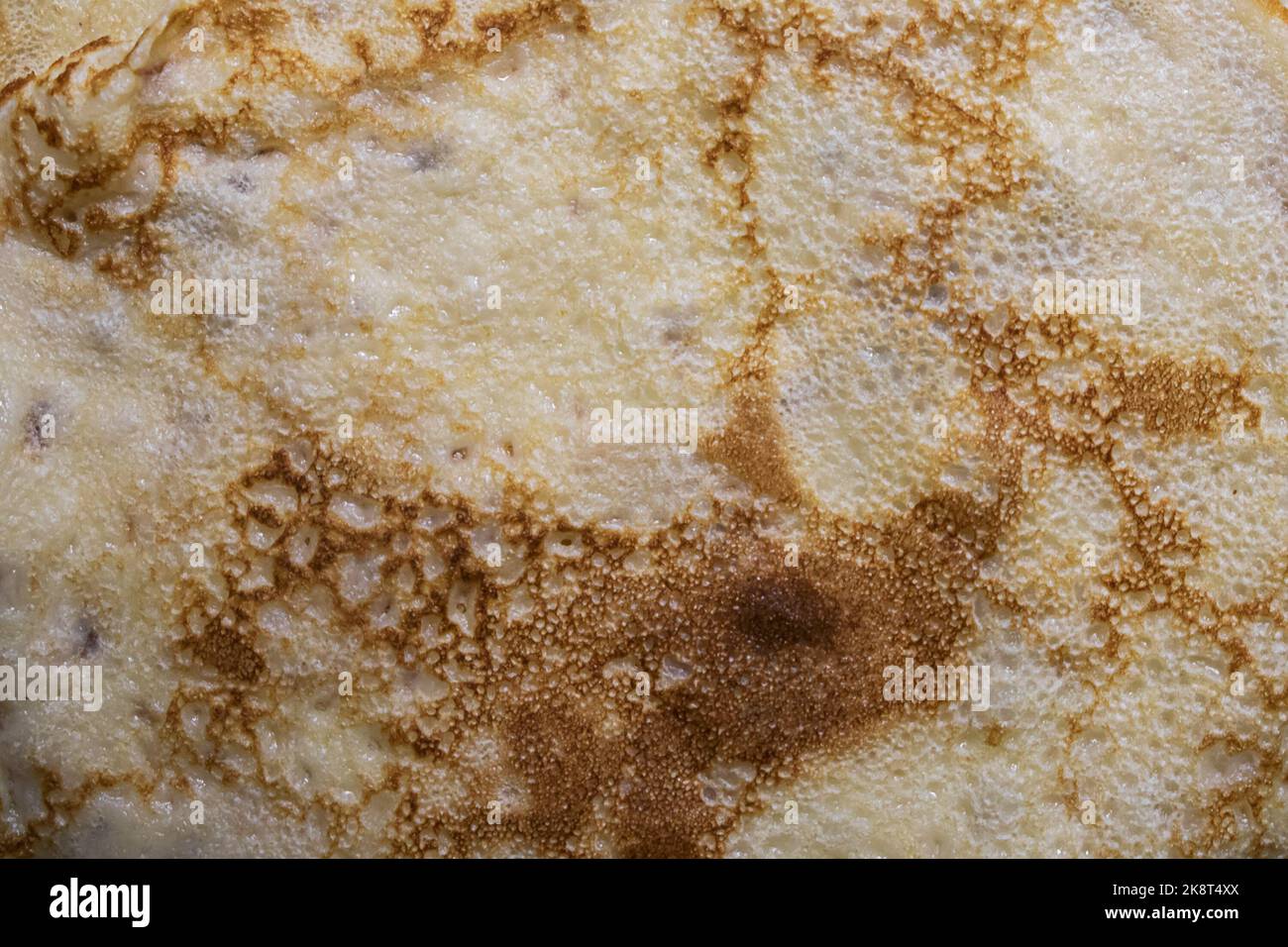 Pancake surface texture and pattern. Close-up of thin hot pancakes in a ...