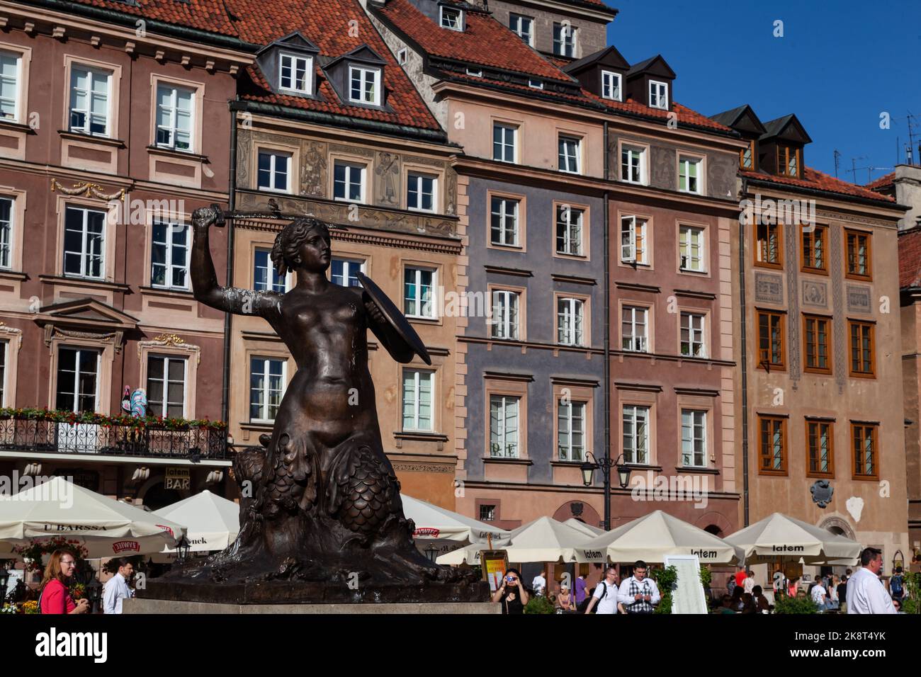 The Mermaid statue Syrenka of Warsaw in Old Town Market Square Stock ...
