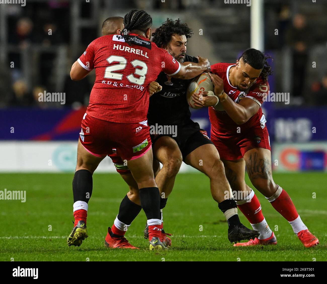 Rhys Williams of Wales is tackled by Konrad Hurrell of Tonga during the ...