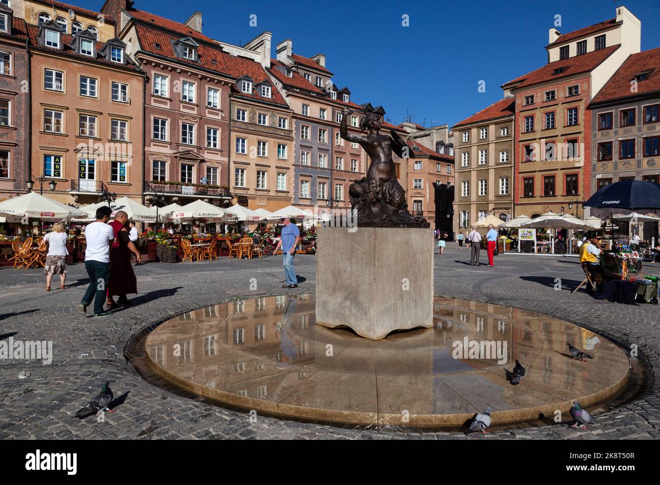 The Mermaid statue Syrenka of Warsaw in Old Town Market Square Stock ...