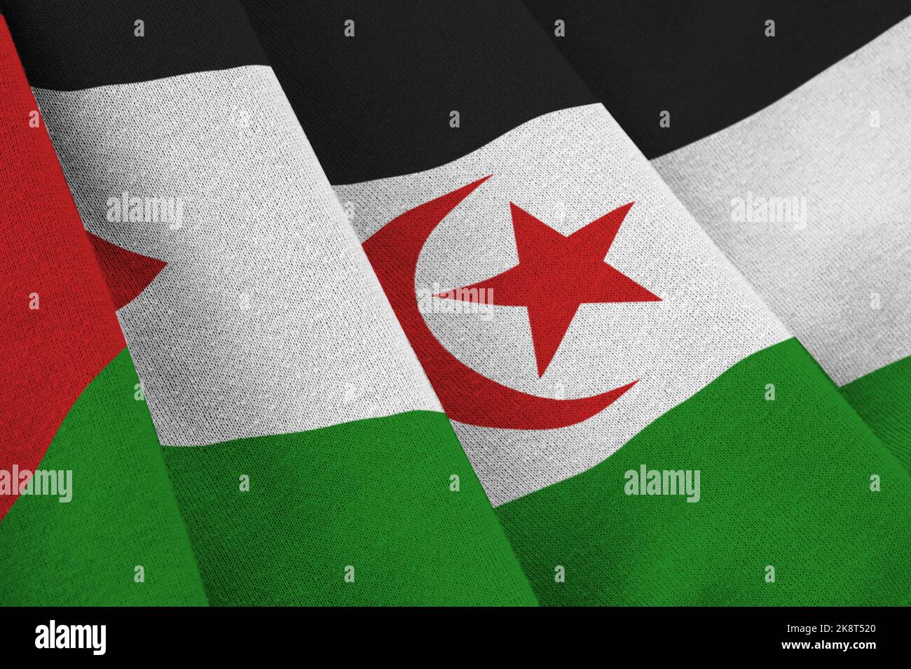 Western Sahara flag with big folds waving close up under the studio ...