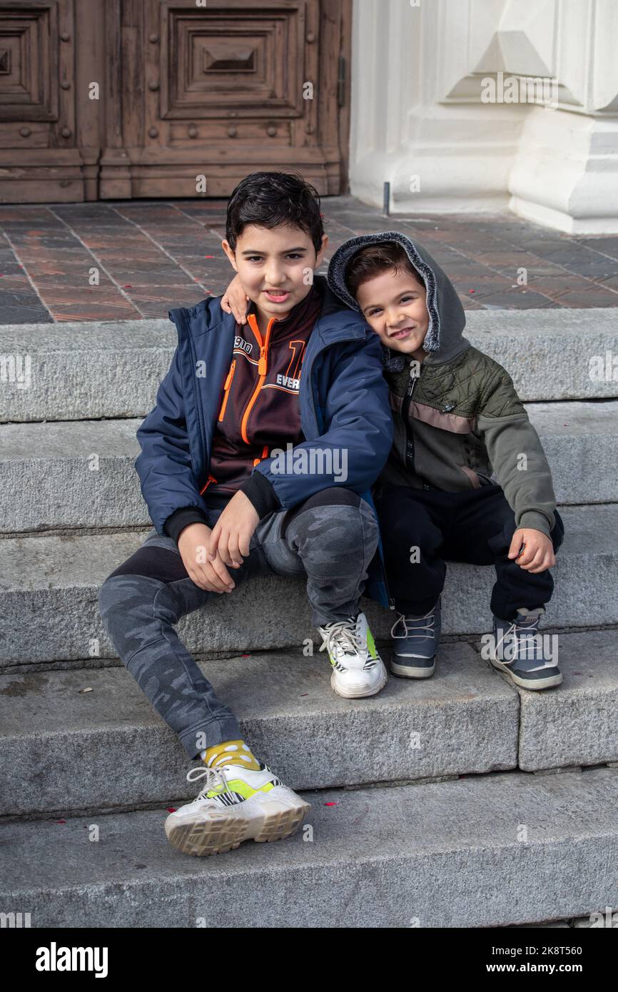 Boys sitting on city hall stairs in Tampere, Finland Stock Photo - Alamy