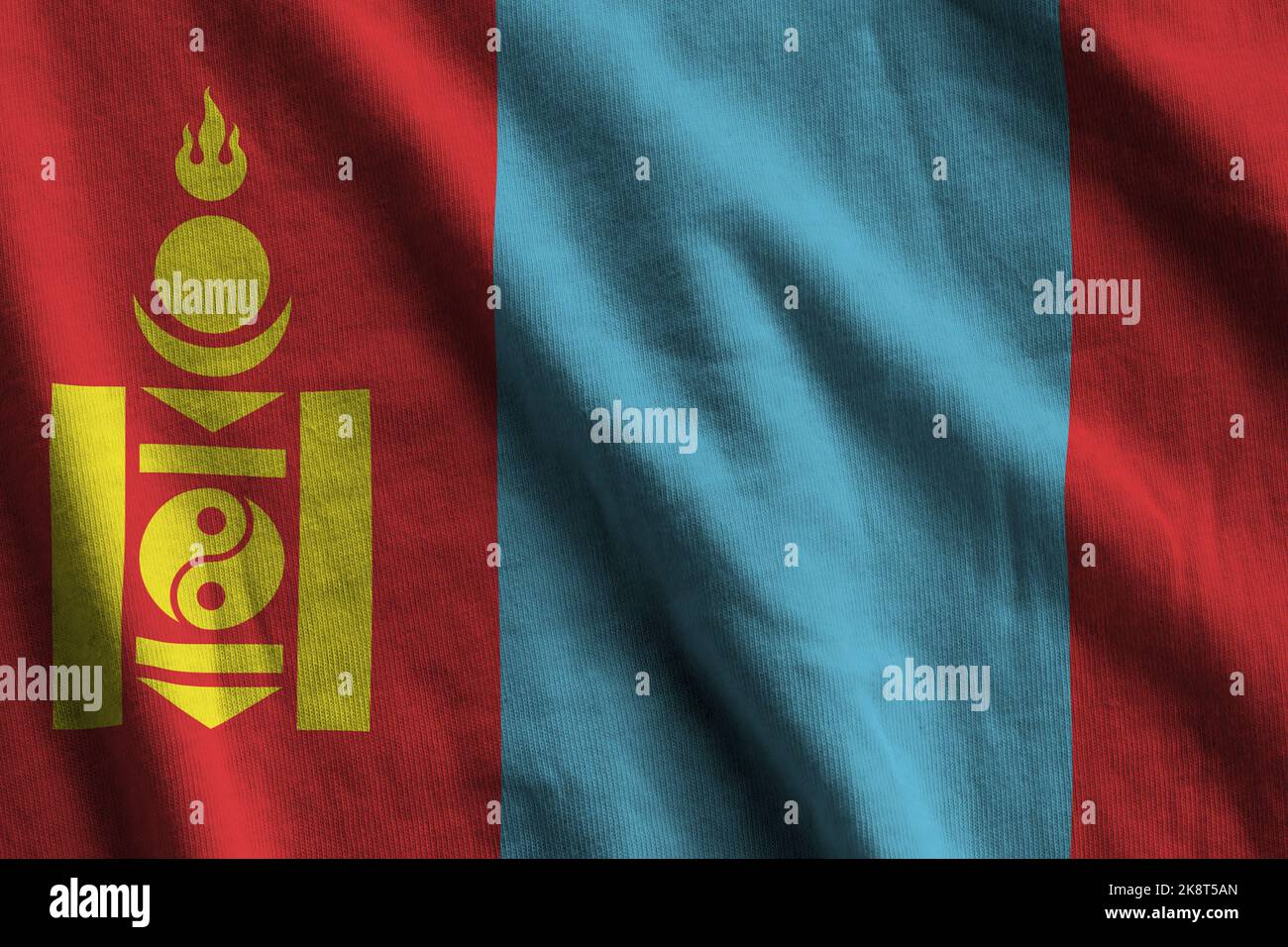 Mongolia flag with big folds waving close up under the studio light ...