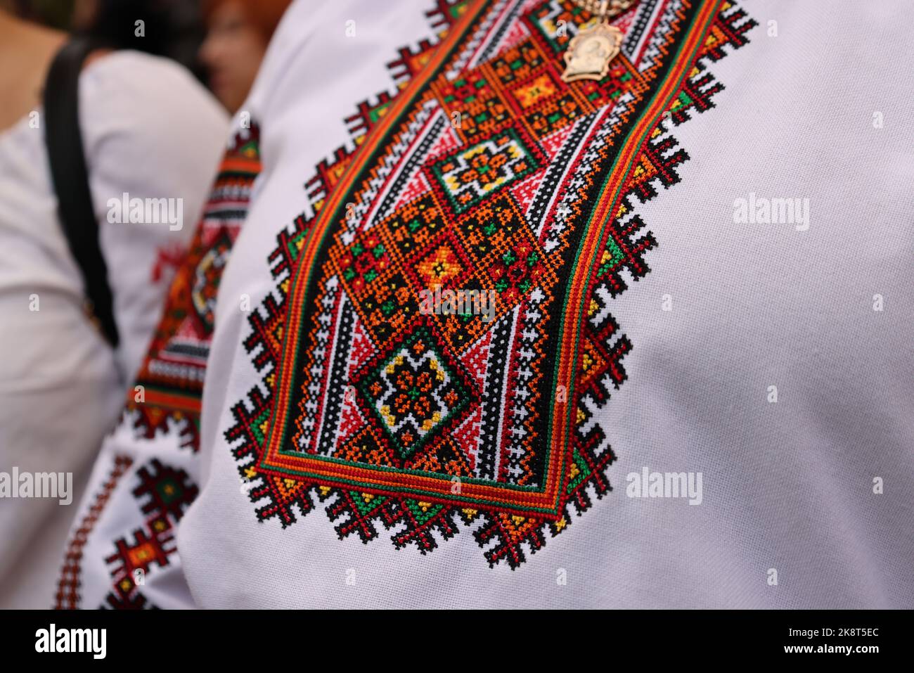 A Closeup Of A Traditional Ukrainian Embroidery On The Womans White