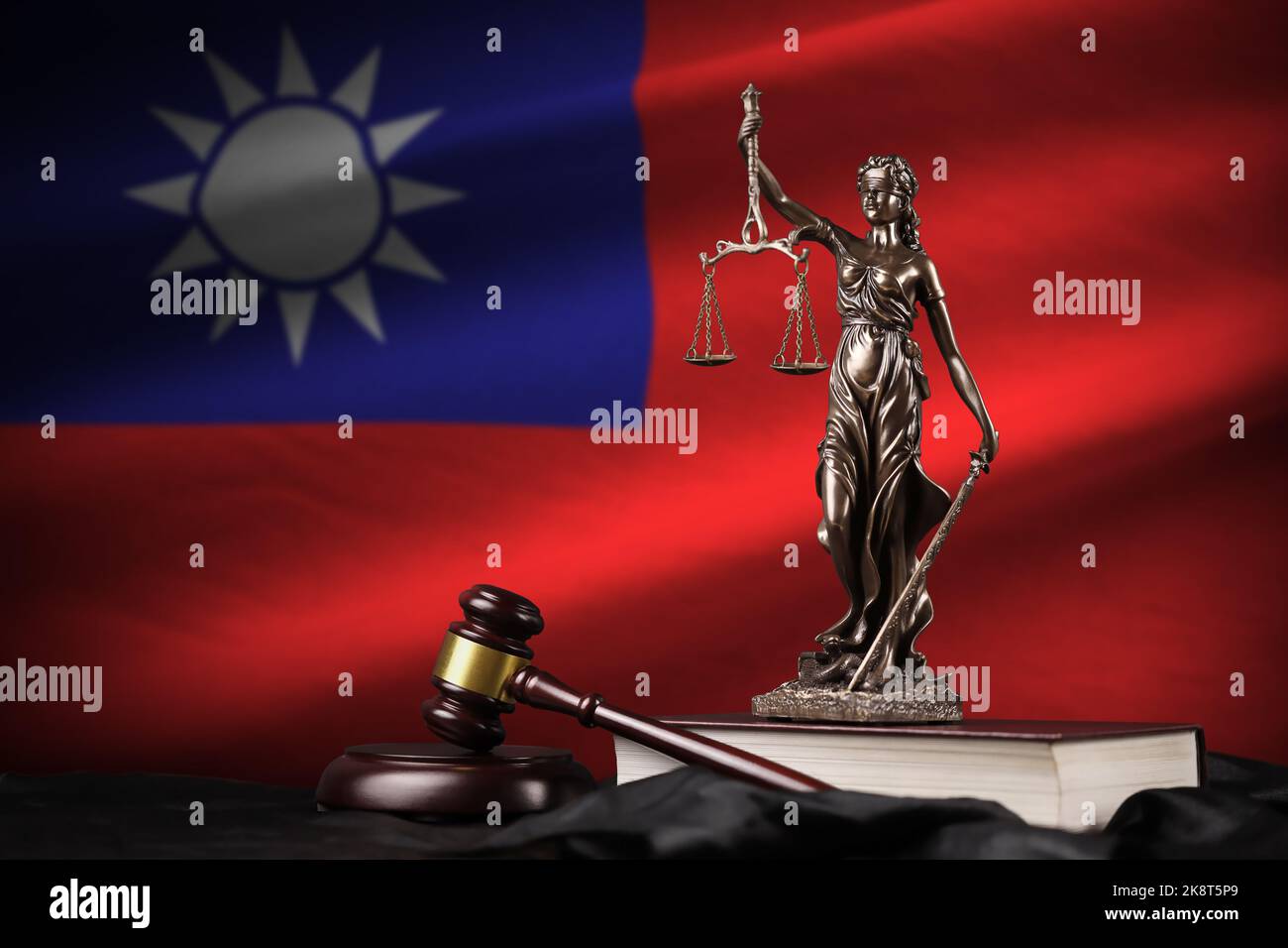Taiwan flag with statue of lady justice, constitution and judge hammer ...