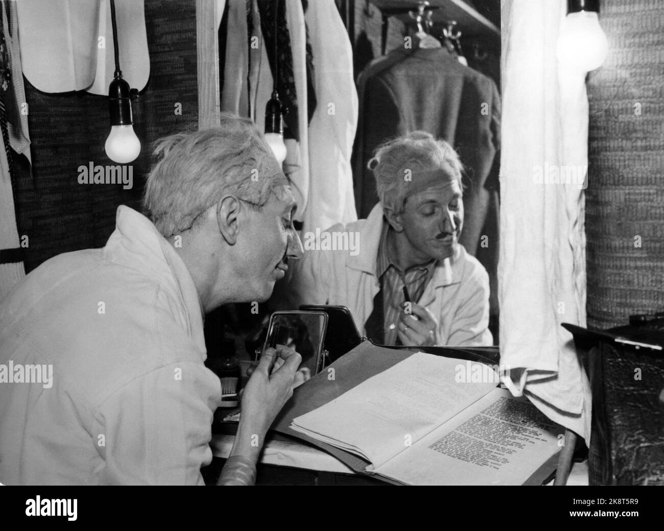 Oslo October 1942: Theater manager and actor Leif adjust makeup in the ...