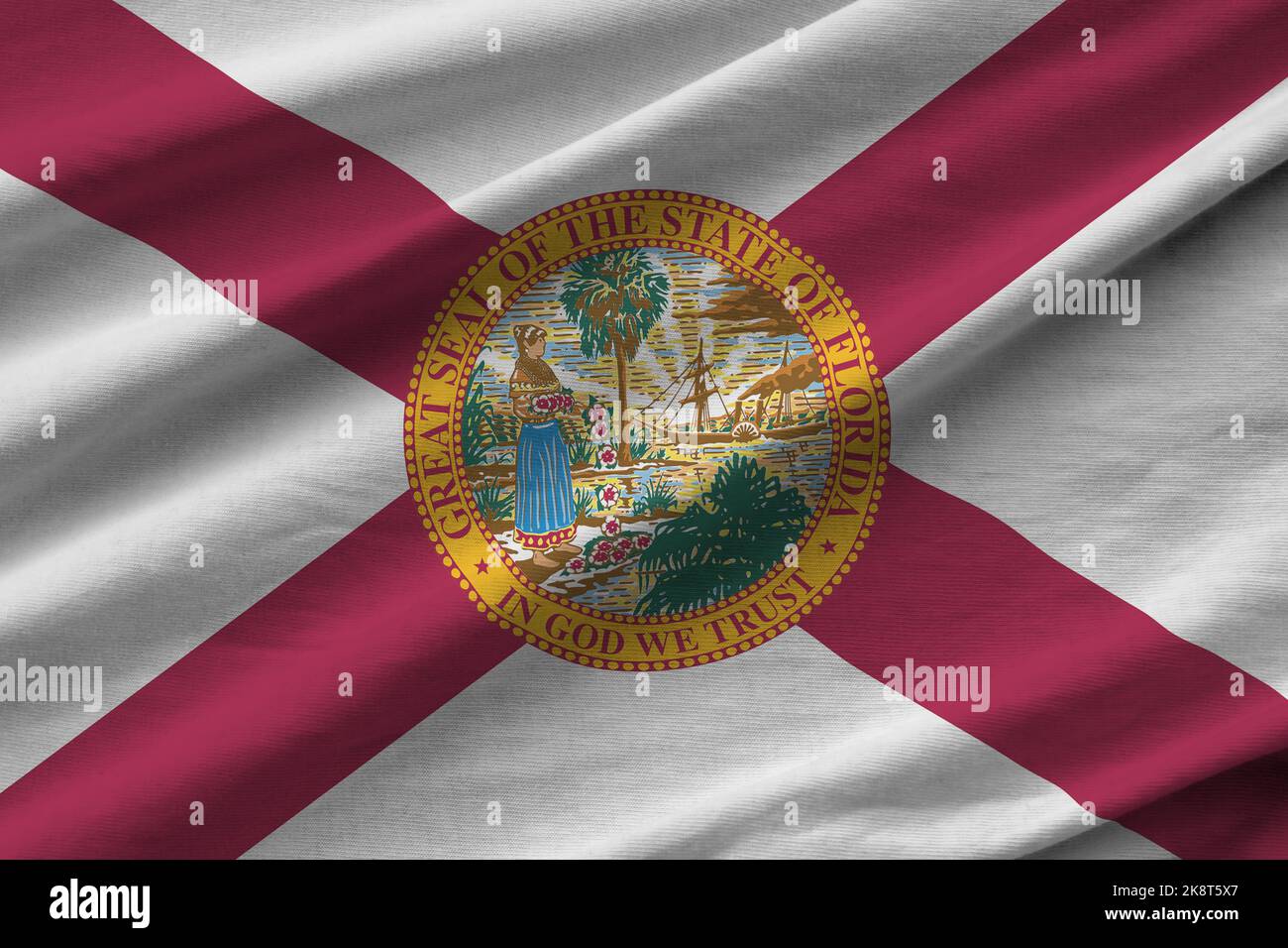 Florida US state flag with big folds waving close up under the studio ...