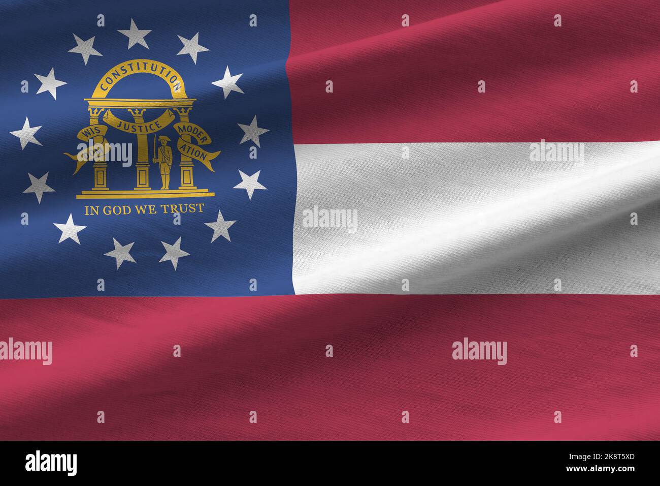 Georgia US state flag with big folds waving close up under the studio ...