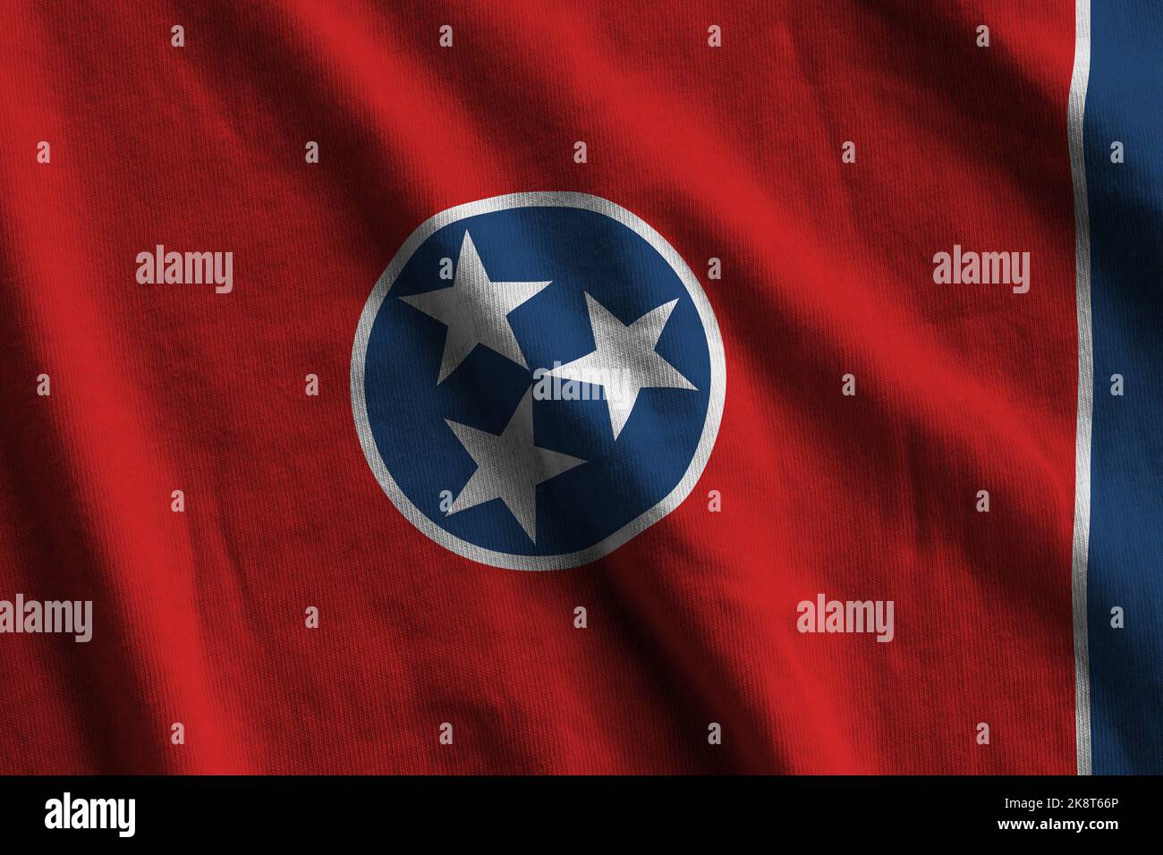 Tennessee US state flag with big folds waving close up under the studio ...
